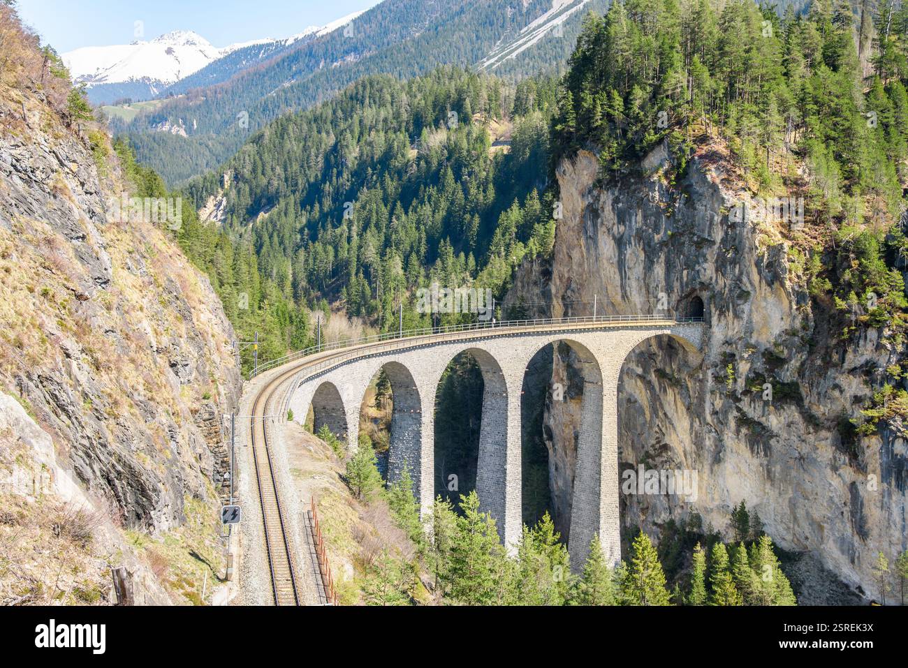 View from above of Landwassen railway viaduct in the Swiss Alps on a ...