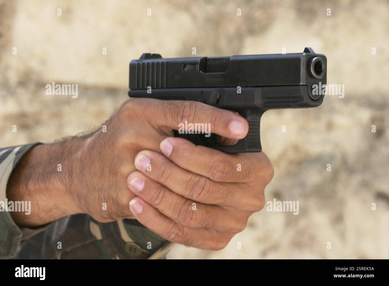 Black Cat commando with a revolver, Glock MR#725 Stock Photo - Alamy