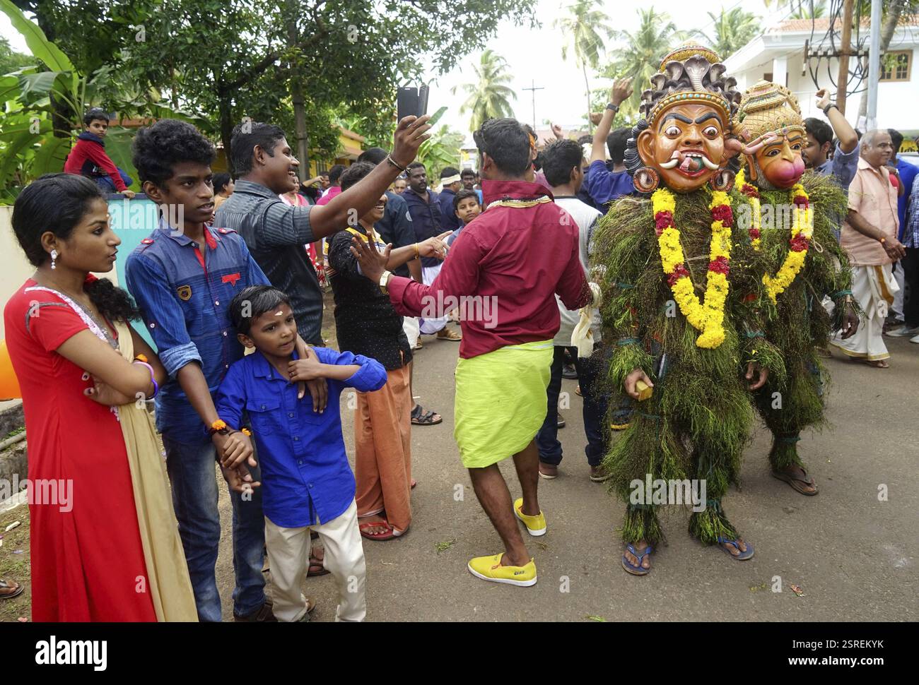 Traditional Kummatti dancers wear wooden masks various gods Kummatti ...