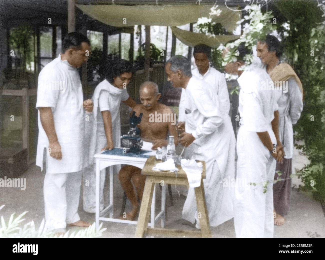 Dr Gajjar showing Mahatma Gandhi hookworm ova under microscope, Mumbai ...