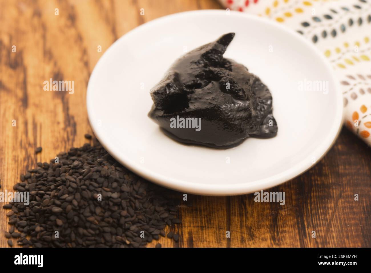 Black sesame paste Stock Photo - Alamy