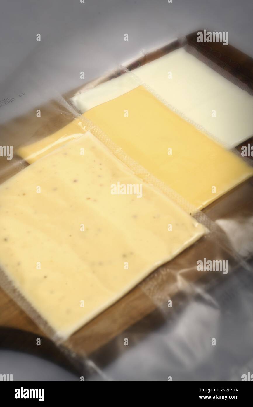 Food, cheese square slices packed in plastic bag Stock Photo - Alamy