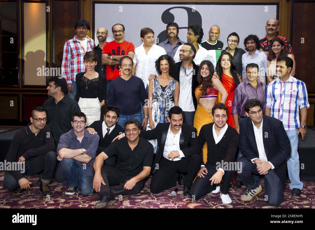 The entire cast and crew pose for a picture during the success party of ...