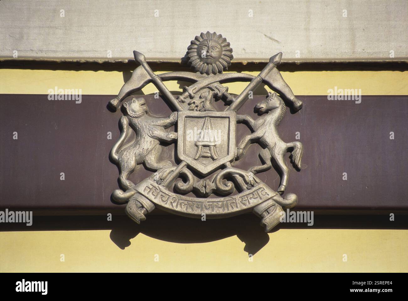 Close up of emblem of Jhalawar state on palace on wheel train at ...