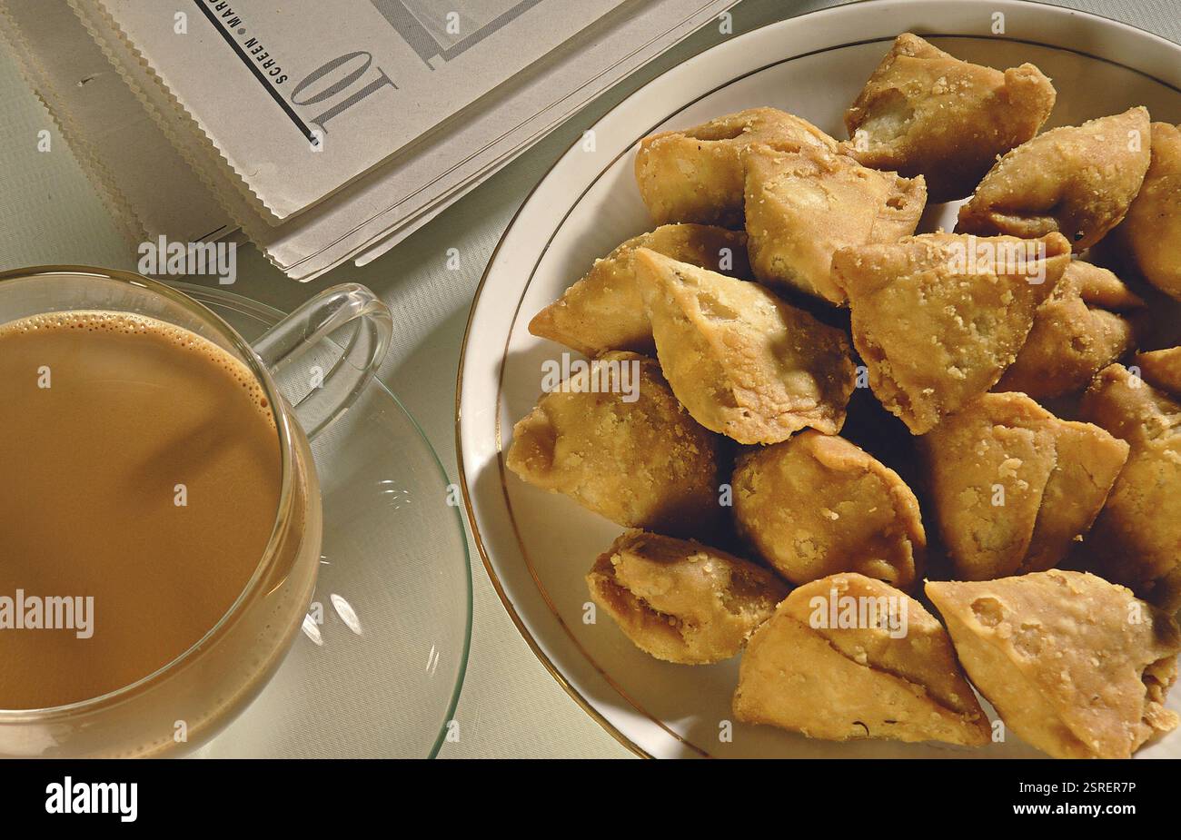 Snacks, namkeen jain samosa in plate with tea, Jodhpur, Rajasthan ...