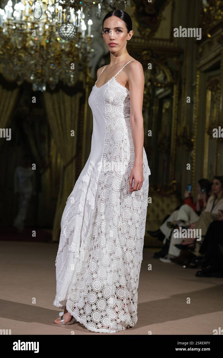 Madrid, Spain. 15th Feb, 2025. A model parades with Adlib Ibiza in Madrid es Moda design during ...