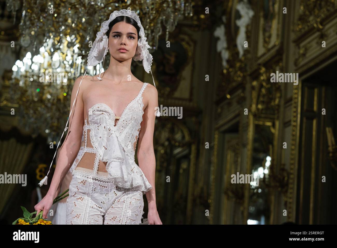 Madrid, Spain. 15th Feb, 2025. A model parades with Adlib Ibiza in Madrid es Moda design during ...