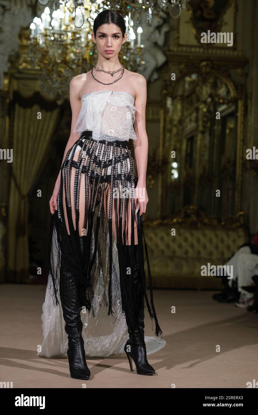 Madrid, Spain. 15th Feb, 2025. A model parades with Adlib Ibiza in Madrid es Moda design during ...