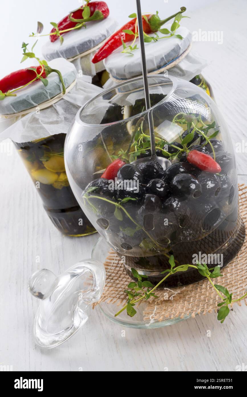 Spicy marinated olives Stock Photo - Alamy
