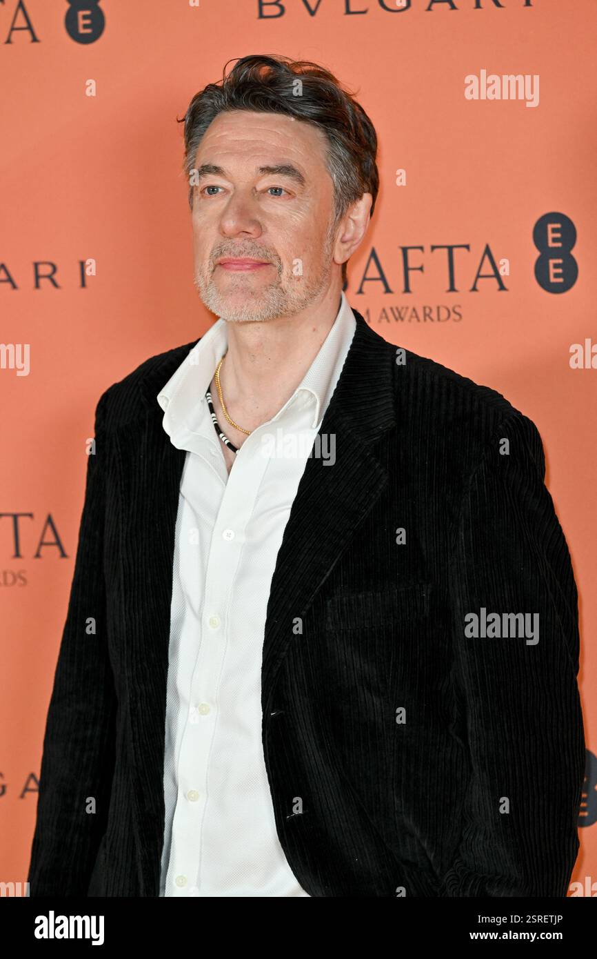 London, UK. 15th Feb, 2025. Peter Straughan attends the 2025 EE BAFTA ...