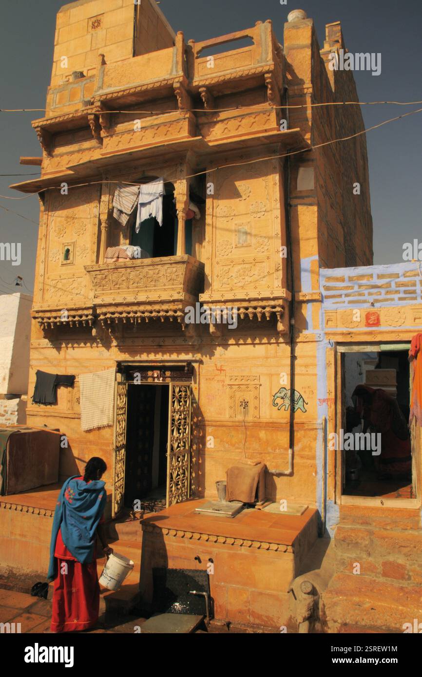 Two storey house made of yellow sandstone, Jaisalmer, Rajasthan, India ...