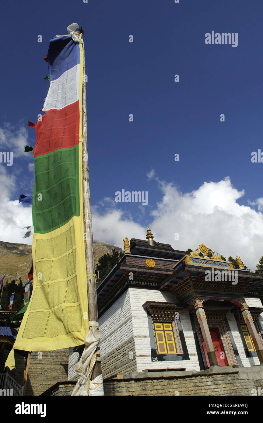 Holy flags at monastery, Upper Pisang, Nepal, Asia Stock Photo - Alamy