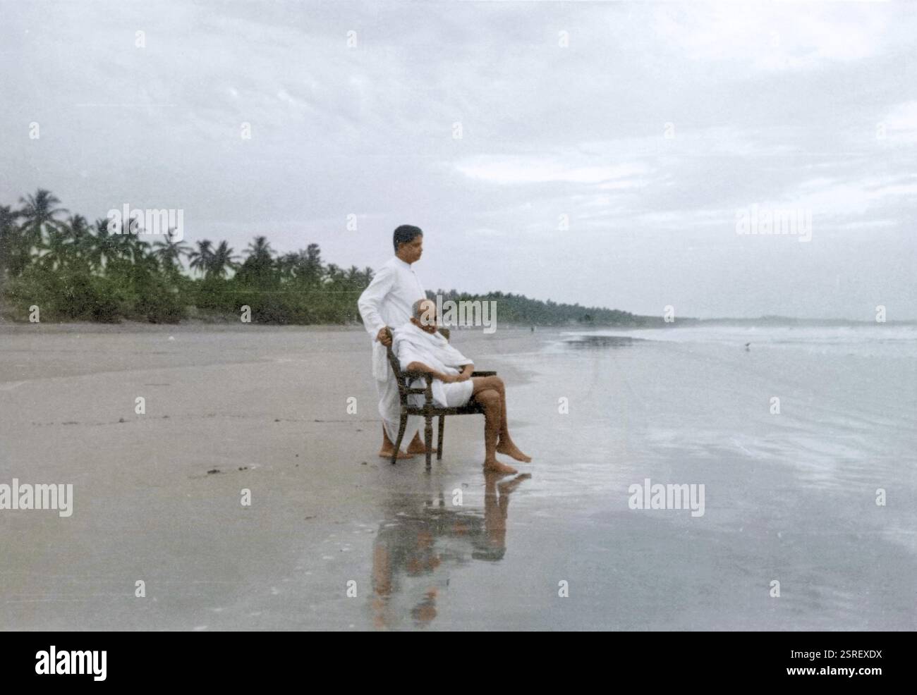 Mahatma Gandhi sitting on chair and Devdas Gandhi, Juhu Beach, Mumbai ...