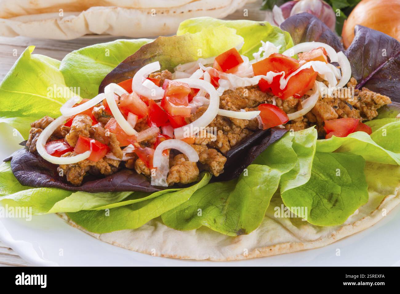 Kebab - grilled meat, bread and vegetables Stock Photo - Alamy