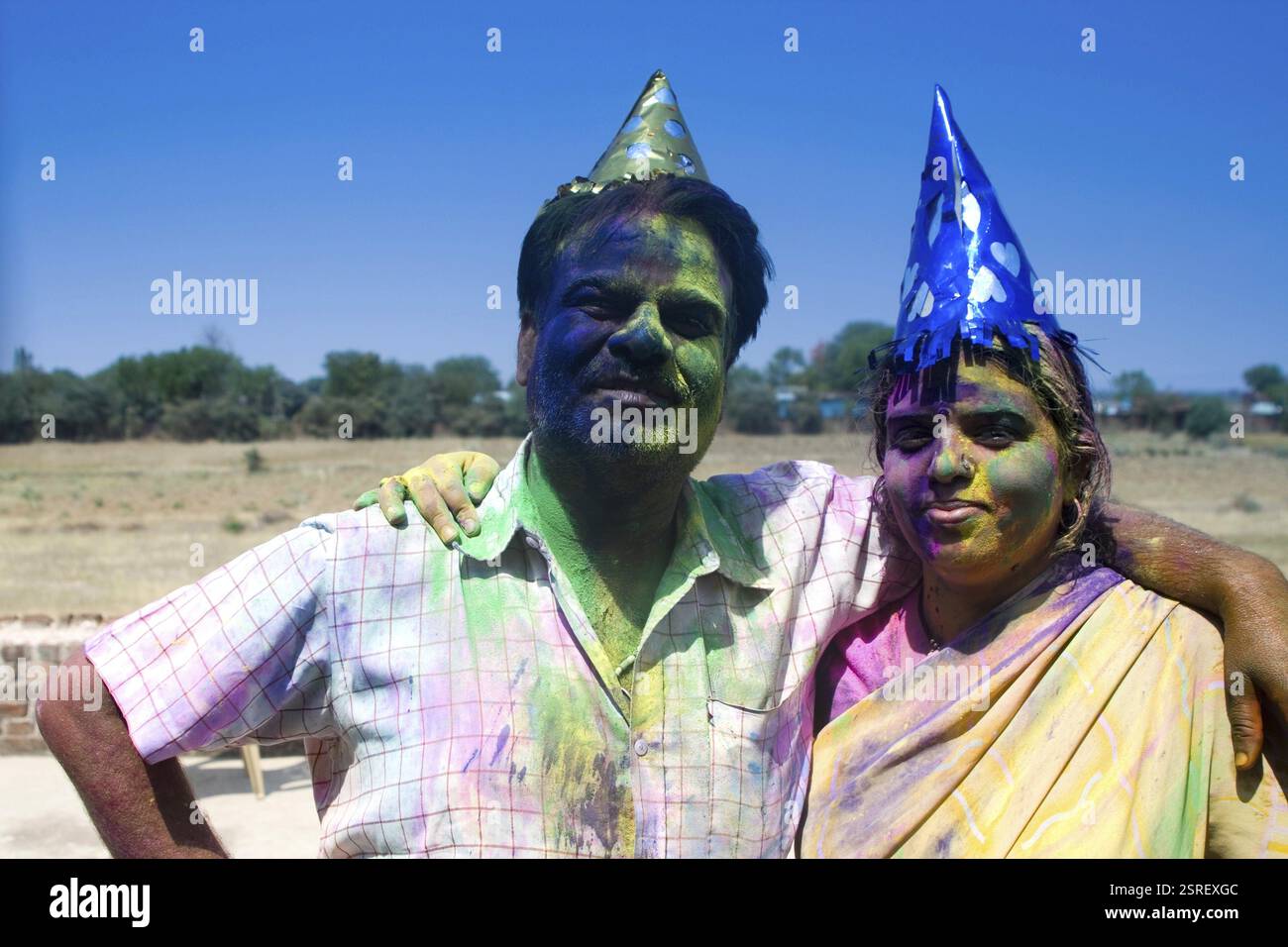 Husband and wife celebrating holi festival, Katni, Madhya Pradesh ...
