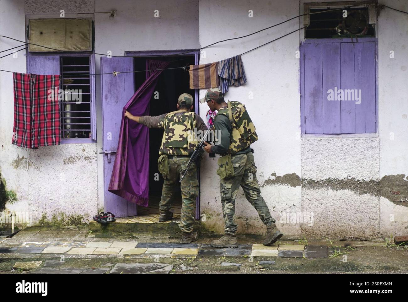 Force One commandos enter house while conducting search combing operation slum area of Uran ...
