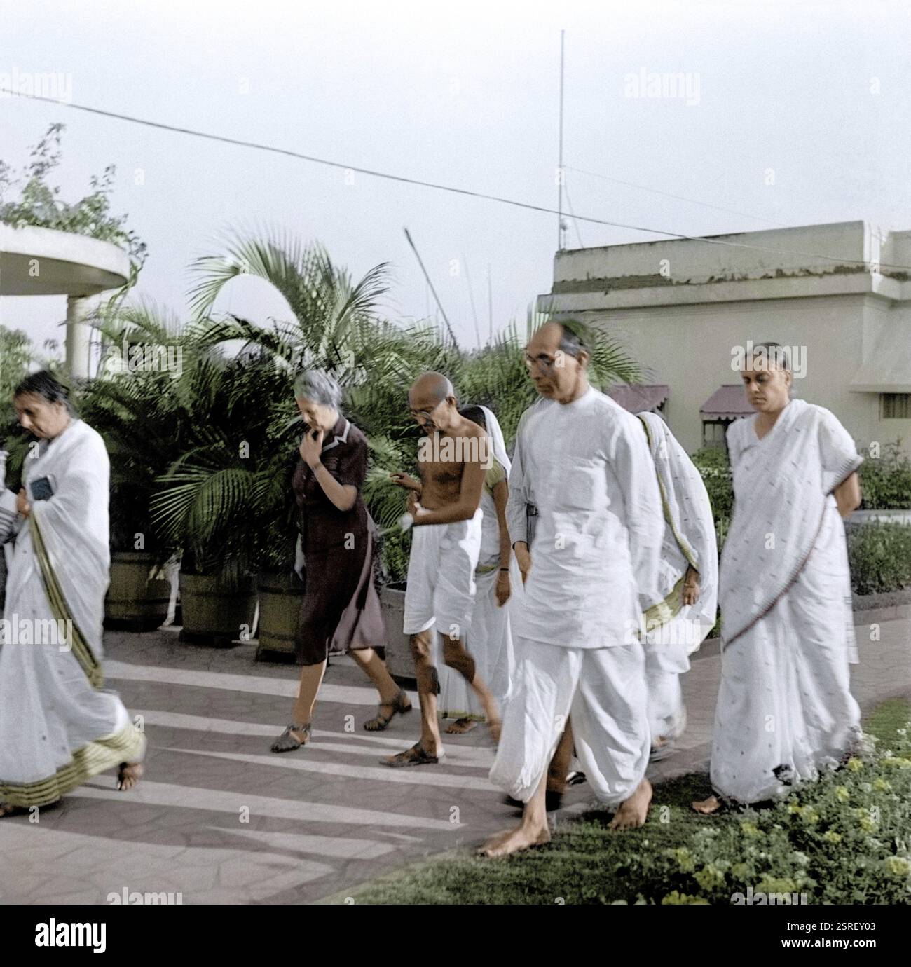 Mahatma Gandhi walking with Agatha Harrison, Birla House, Mumbai ...