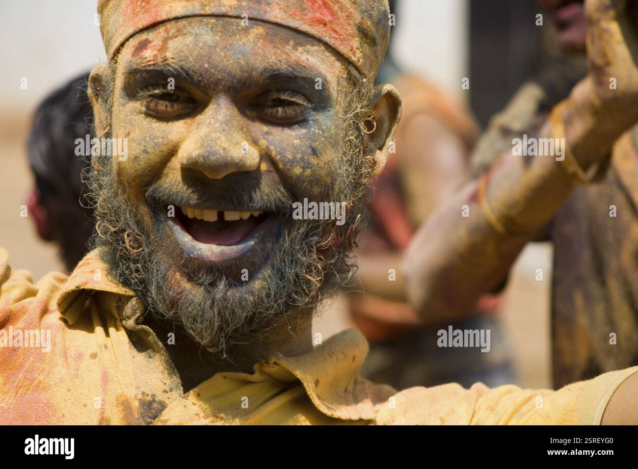 Panjabi sardar man celebrating holi festival enjoying laughing and ...