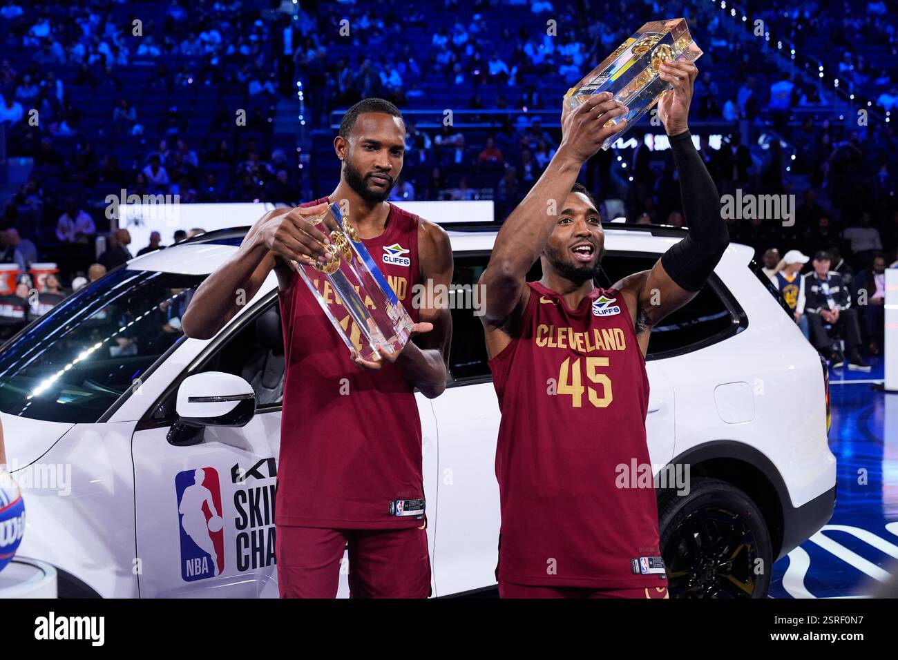 Cleveland Cavaliers center Evan Mobley, left, and guard Donovan ...