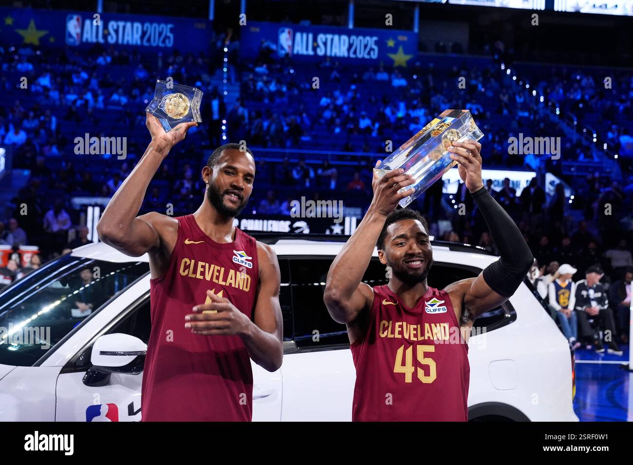 Cleveland Cavaliers center Evan Mobley, left, and guard Donovan ...