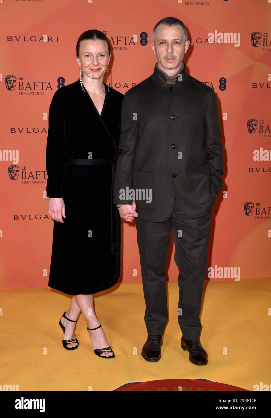 London, UK. February 15th, 2025. Emma Wall and Jeremy Strong arriving ...