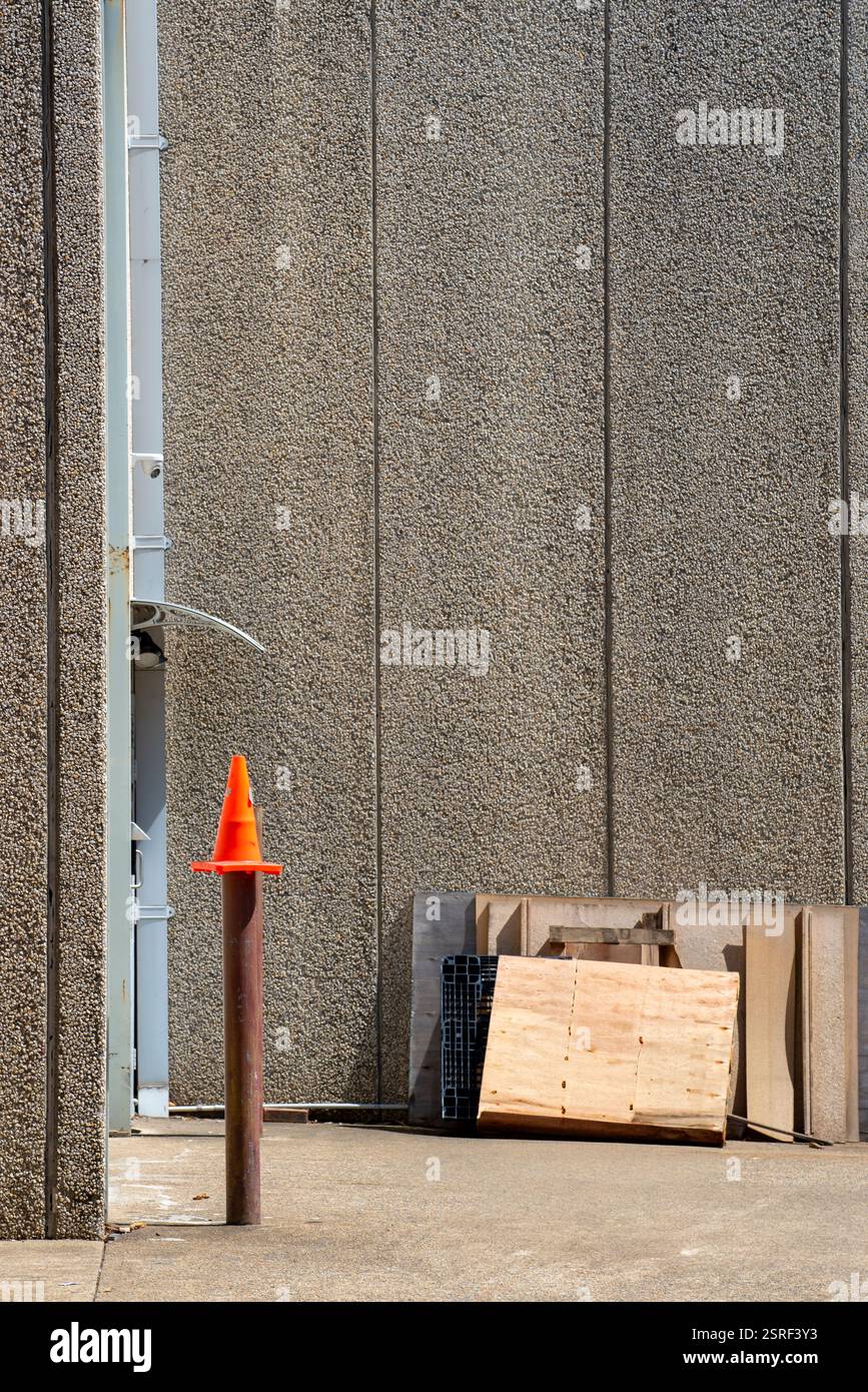 Pieces of timber stacked against an exterior wall of a tilt up ...