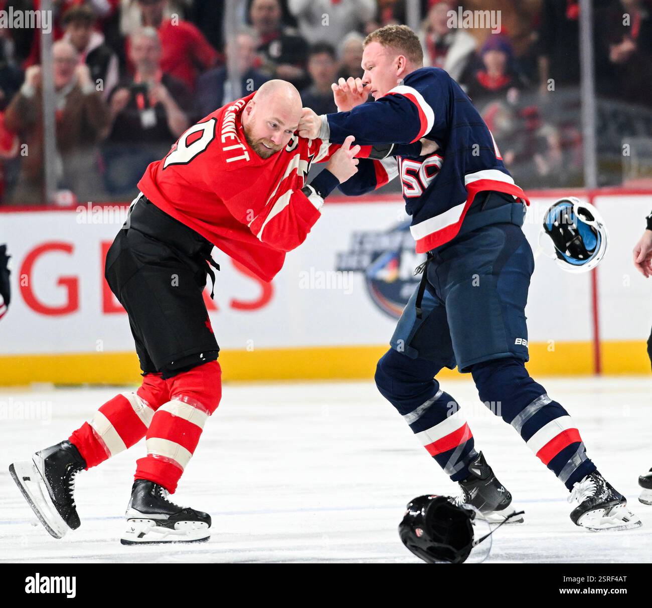 Montreal, Canada. 15th Feb, 2025. Canada's Sam Bennett (9) fights with ...