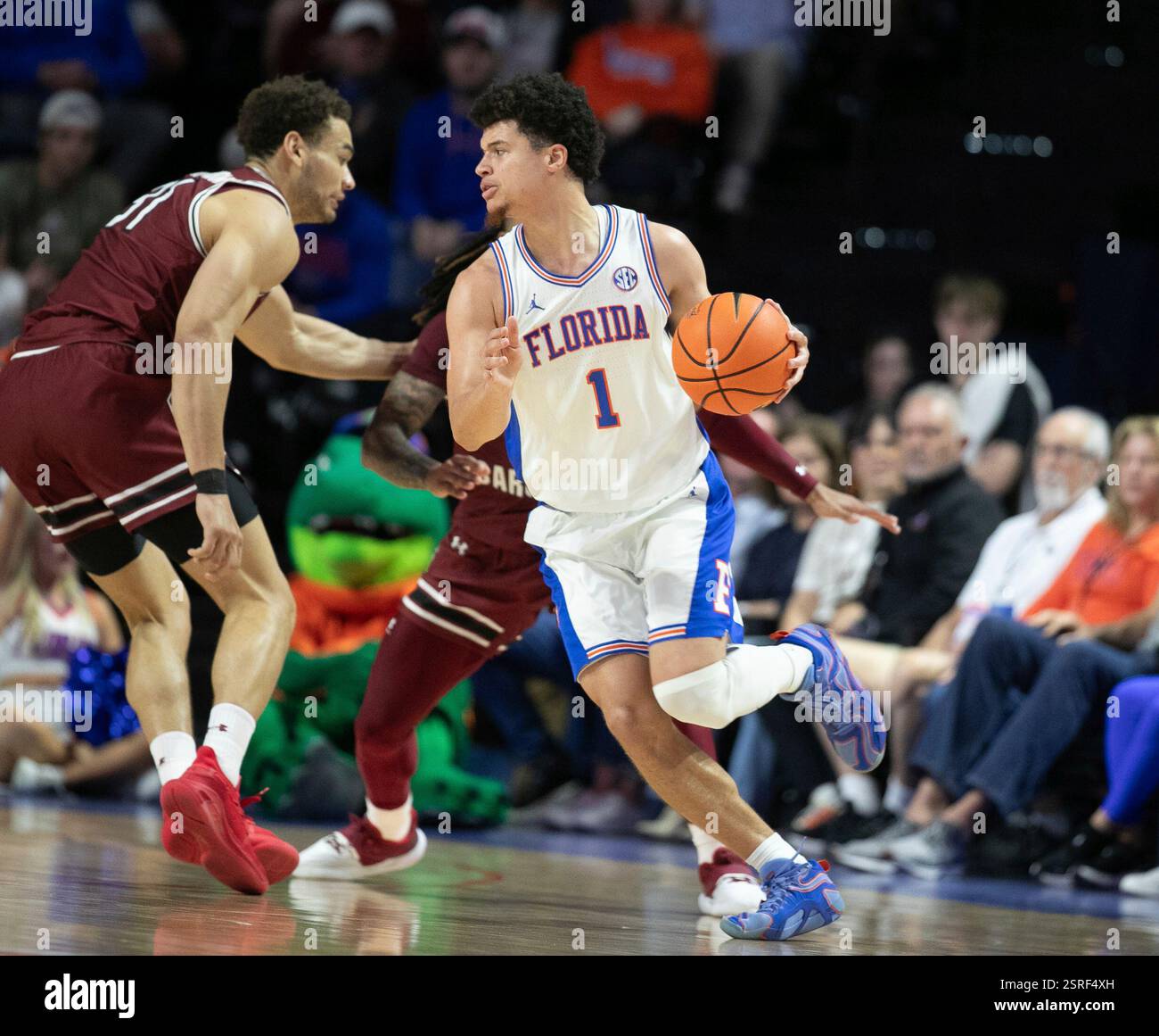 Florida guard Walter Clayton Jr. (1) drives on South Carolina forward ...