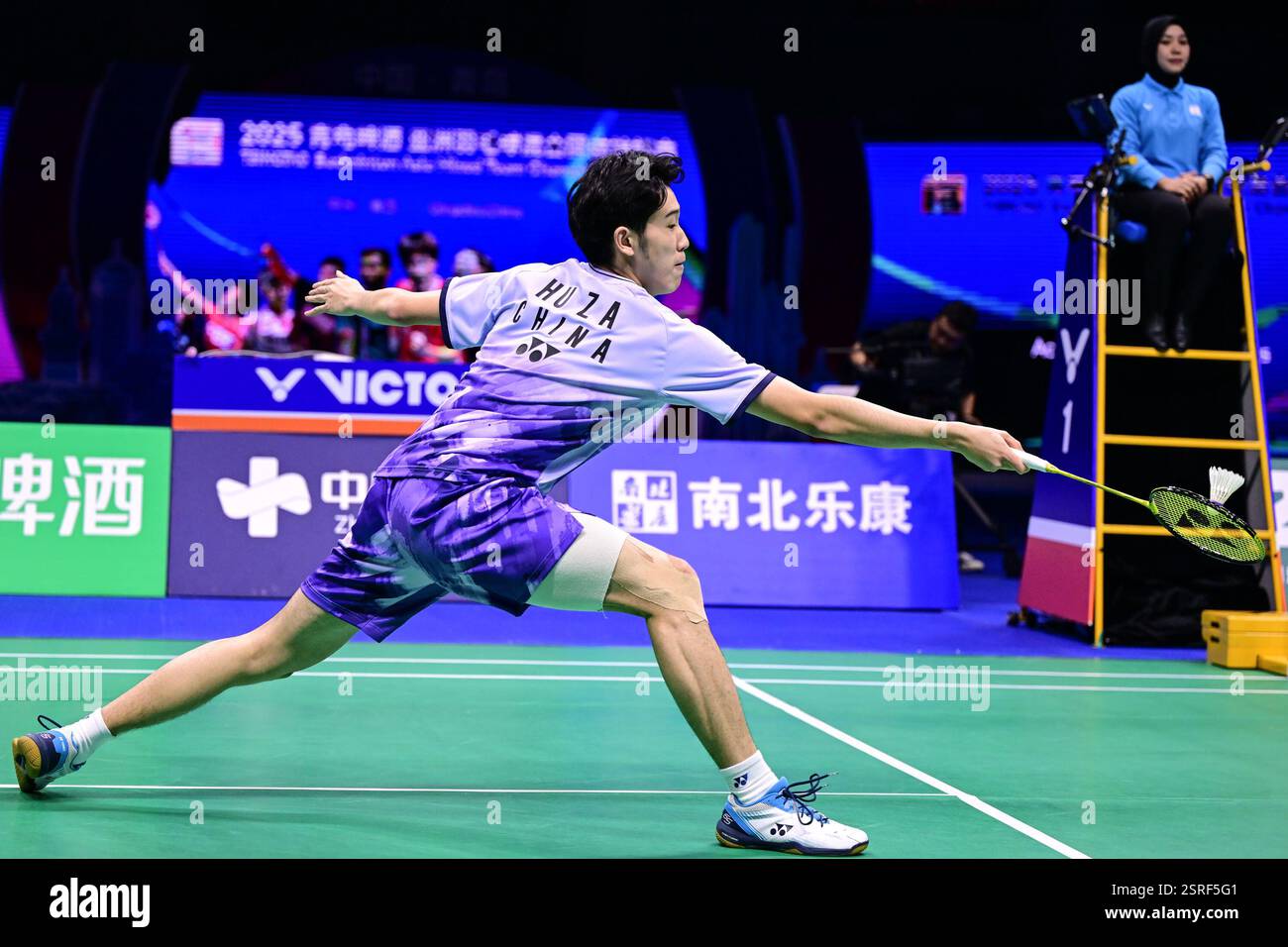 QINGDAO, CHINA - FEBRUARY 15, 2025 - Chinese player HU Zhe An VS TANAKA Yushi of Japan during ...