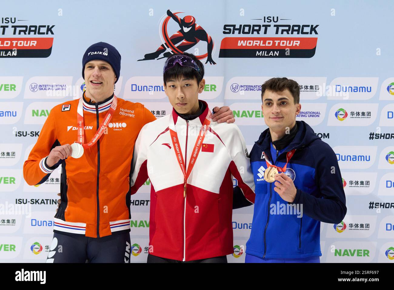 Milan, Italy. 15th Feb, 2025. Sun Long (C) of China, Teun Boer (L) of ...