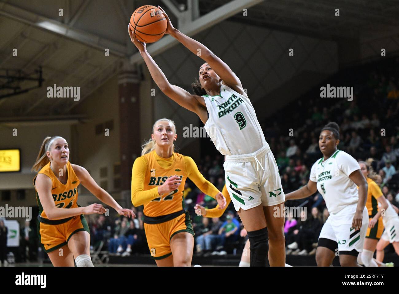 North Dakota Fighting Hawks forward Kiera Pemberton (9) grabs a rebound ...