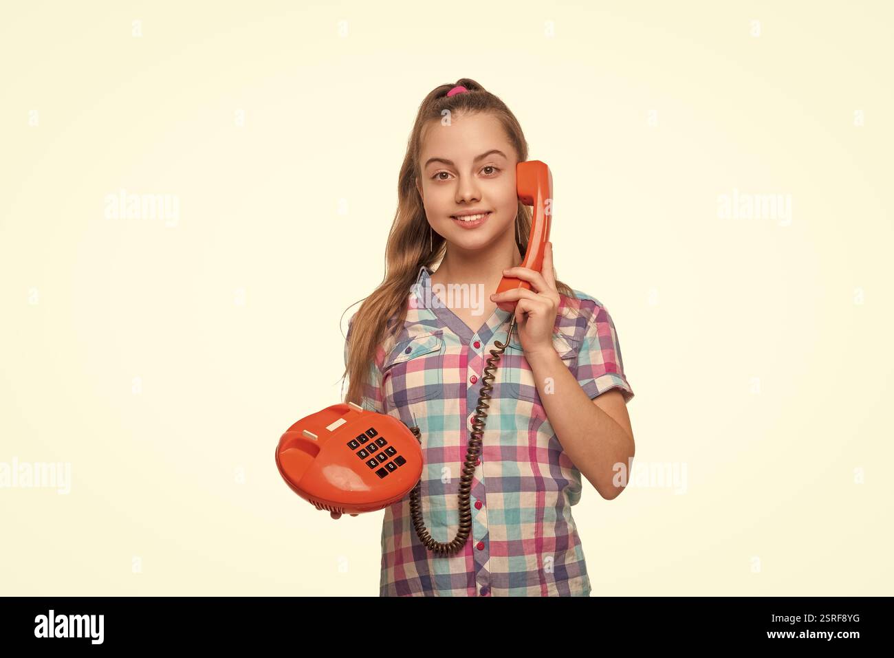 Nostalgia concept. Retro rotary telephone technology. Girl having a ...