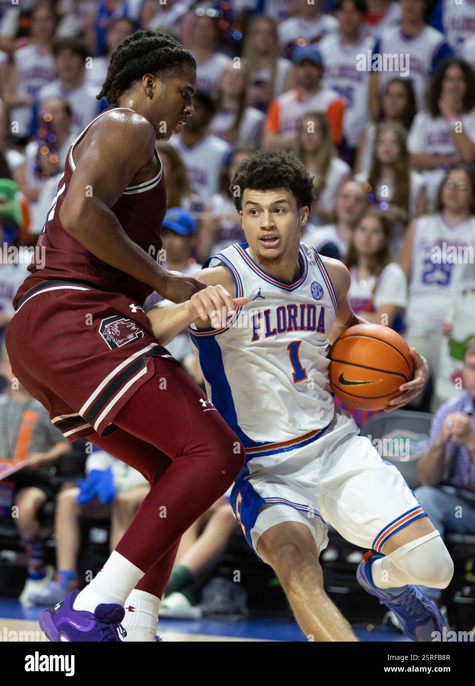 Florida guard Walter Clayton Jr. (1) drives on South Carolina forward ...