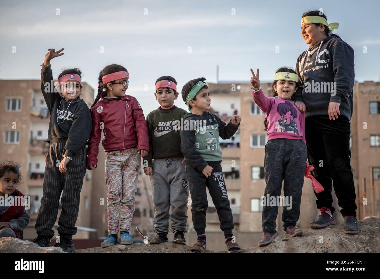 Hasaka, Syria. 15th Feb, 2025. Children pose as friends and family ...