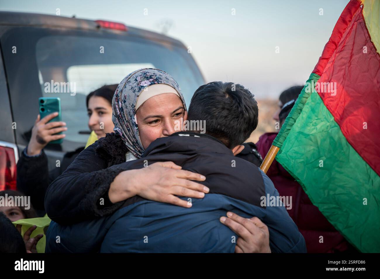 Hasaka, Syria. 15th Feb, 2025. Friends and family members welcome back ...