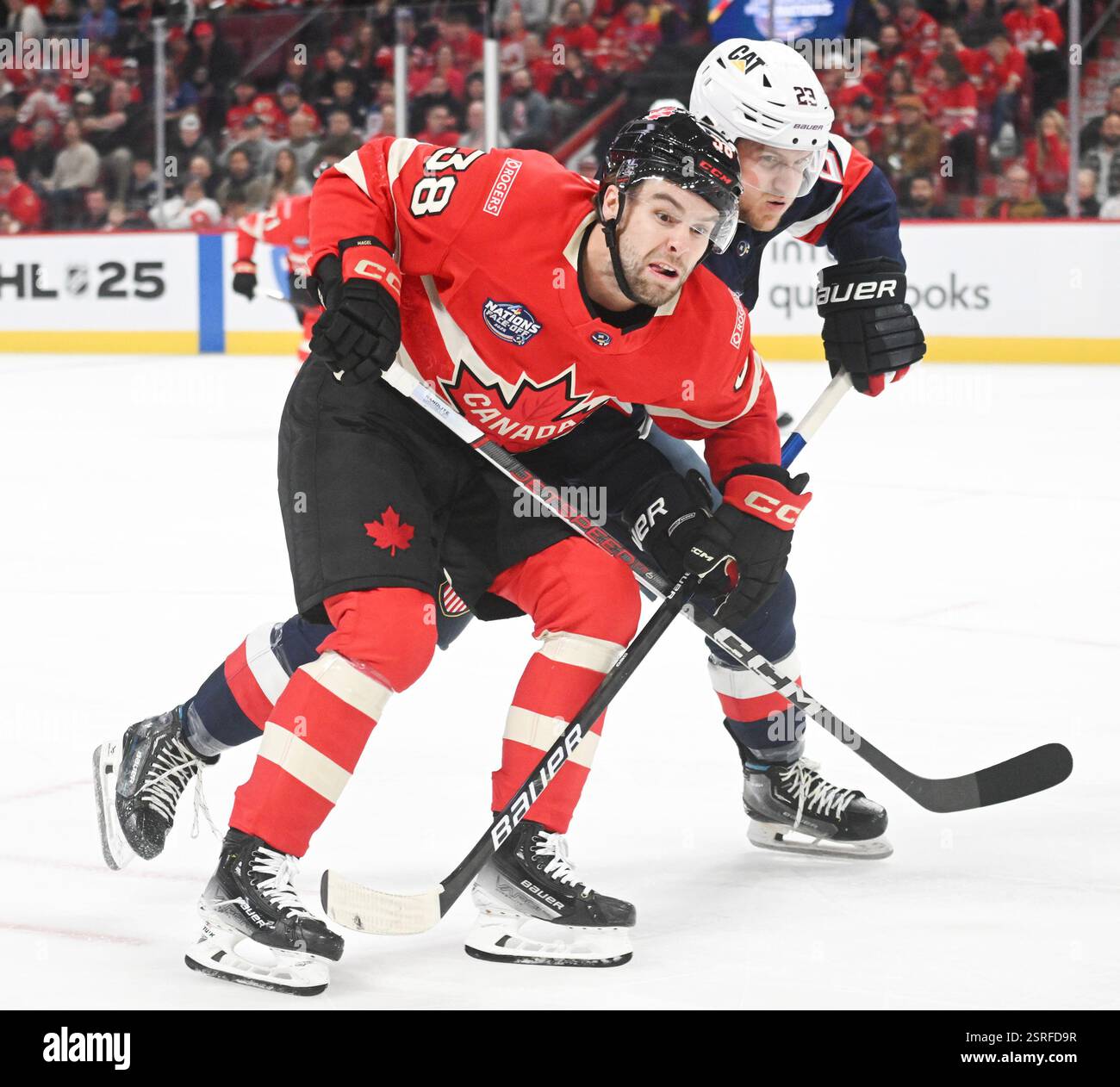 Montreal, Canada. 15th Feb, 2025. United States' Adam Fox (23) defends ...