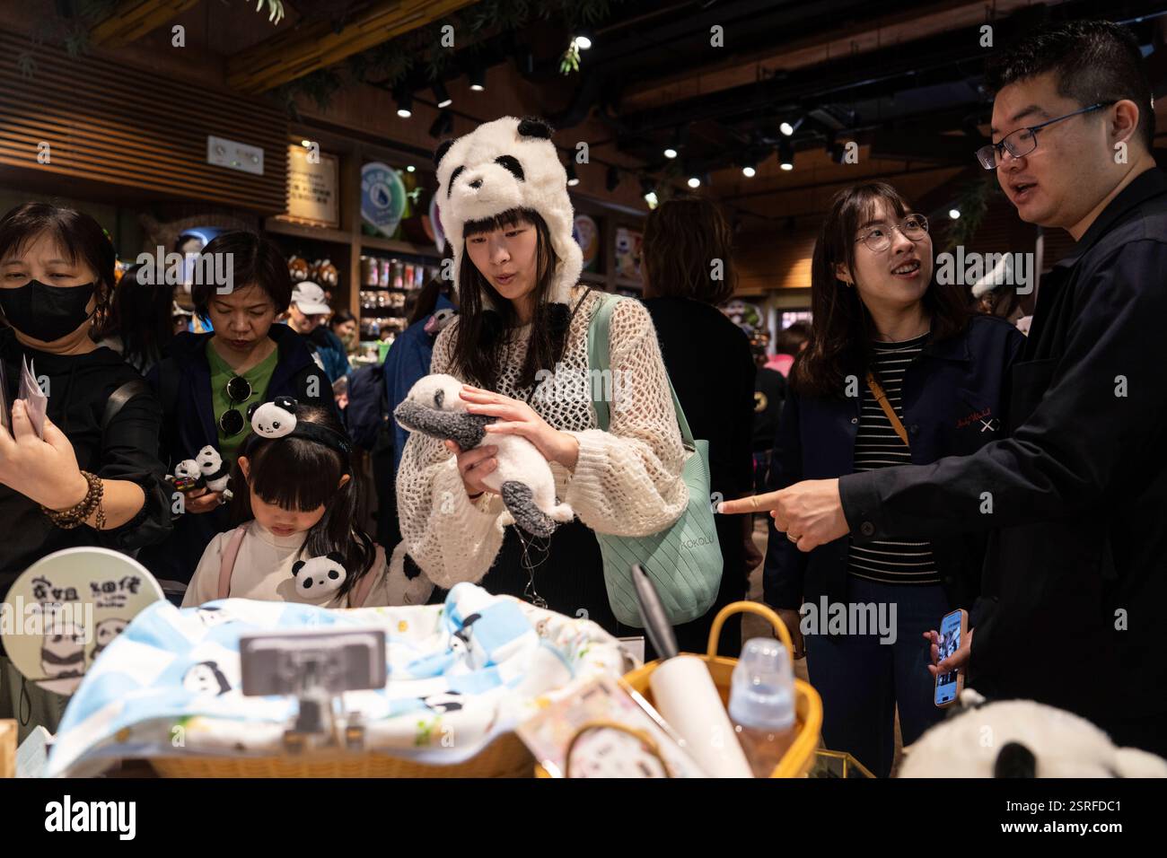 Visitors shop at a panda-themed store in Ocean Park as the Hong Kong ...