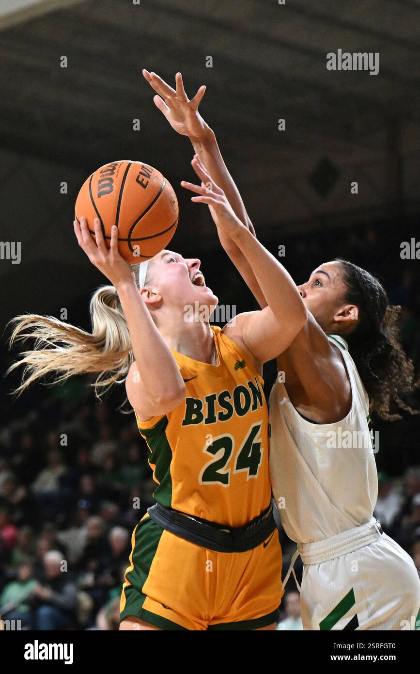 North Dakota State Bison guard Abby Schulte (24) attempts to get a shot ...