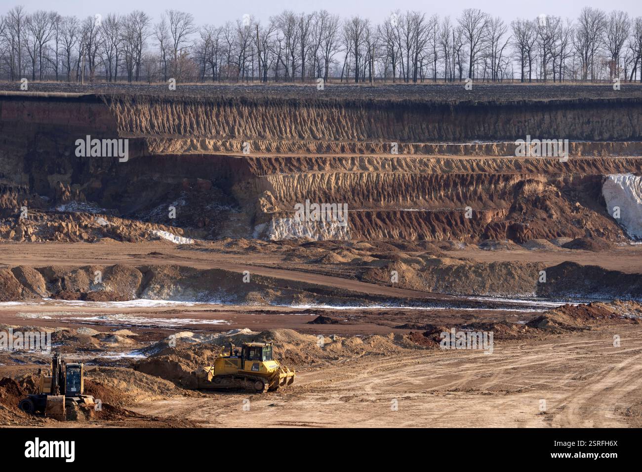 A view of an ilmenite open pit mine in a canyon in the central region ...