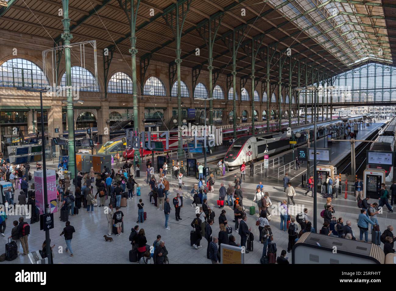 Paris Nord / Paris Gare Du Nord railway station concourse with TGV Duplex train and rail ...