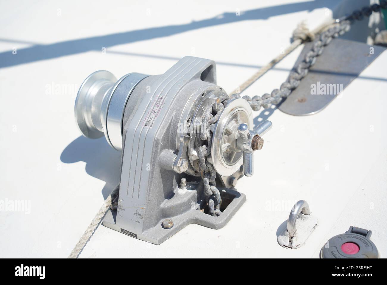 Anchor winch with sturdy chain on a voyage boat, ensuring stability and ...