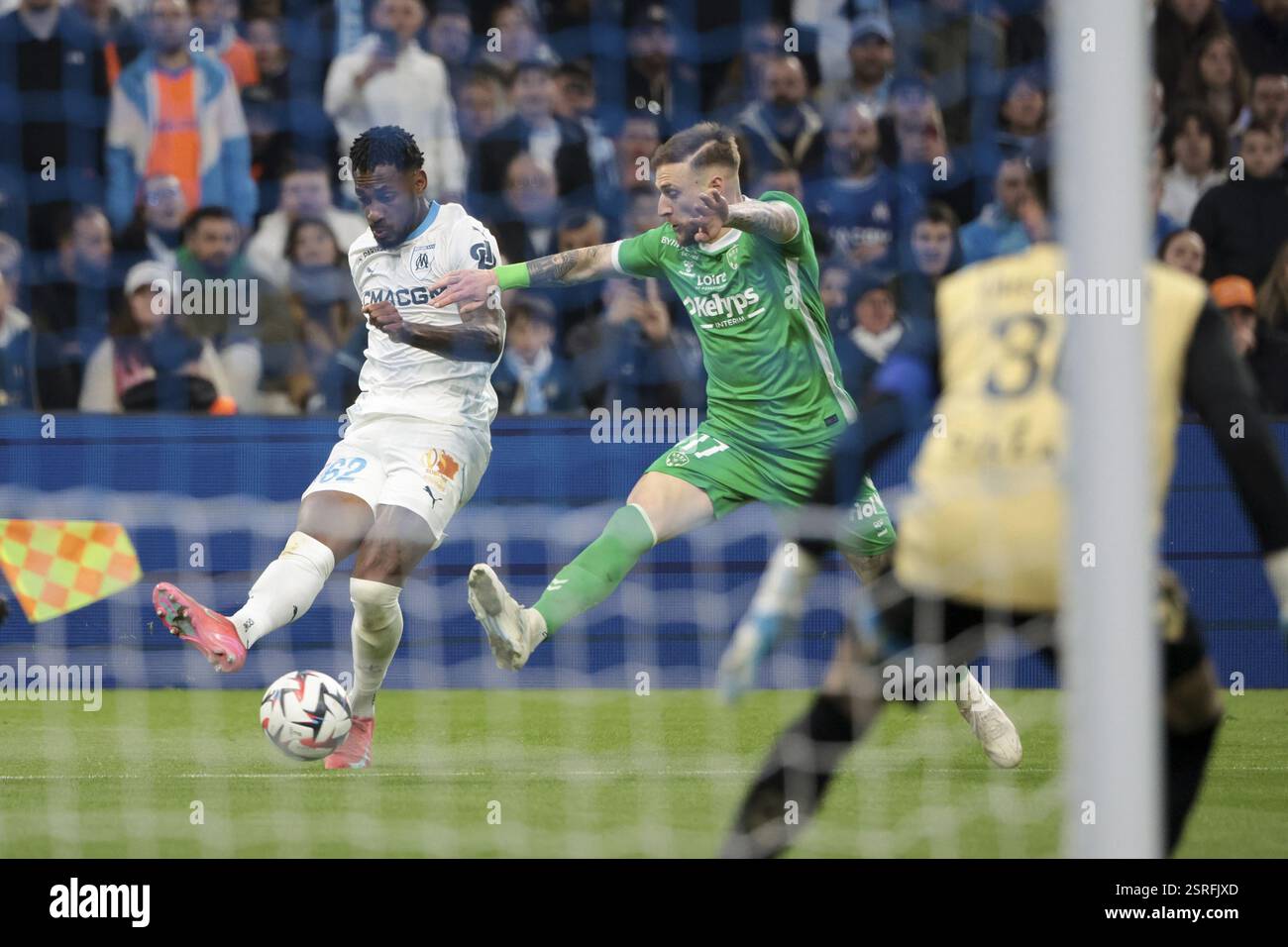 Michael Amir Murillo of Marseille, Pierre Cornud of Saint-Etienne ...