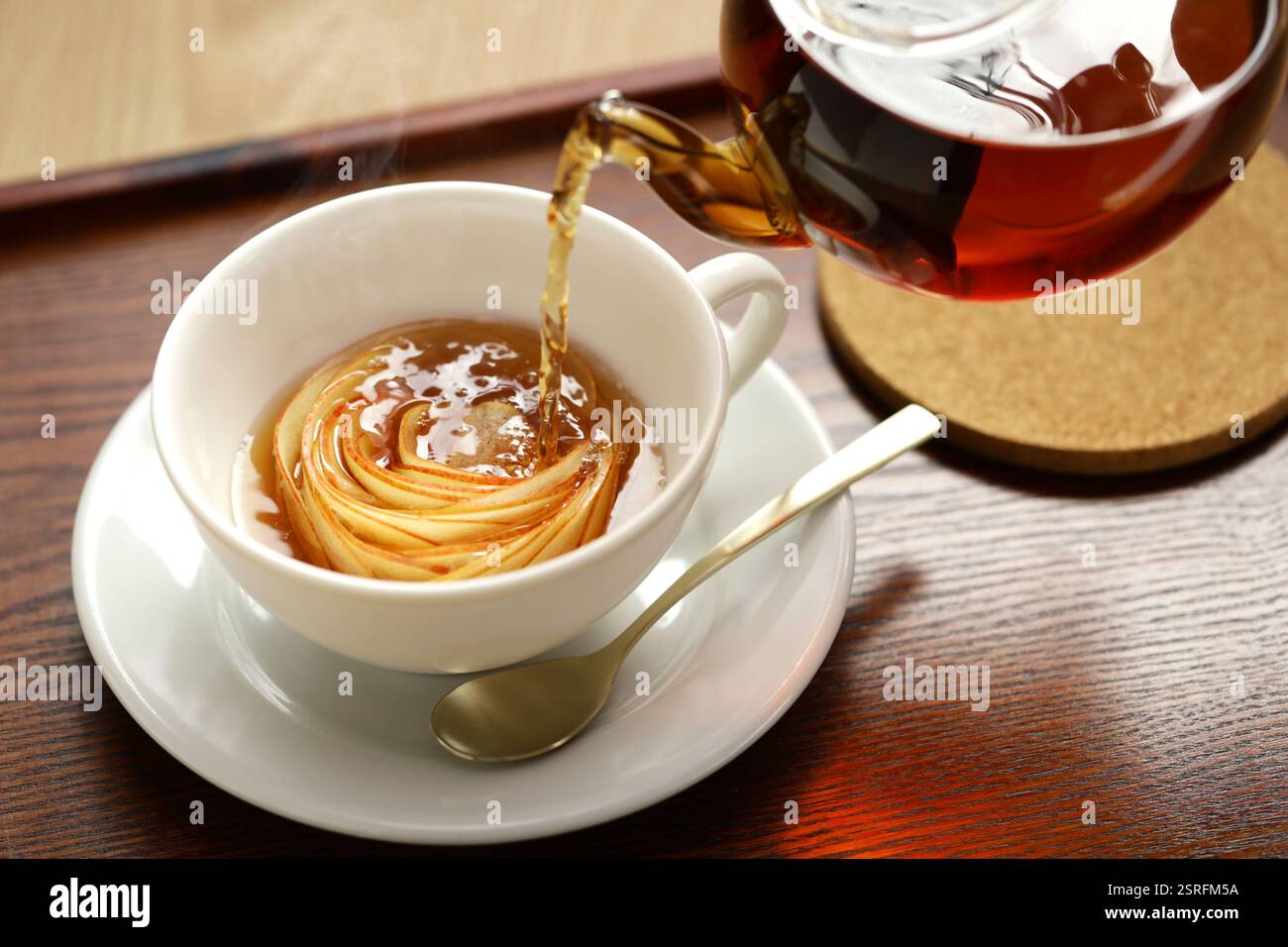 How to brew apple tea like a rose flower. fruity beverage Stock Photo ...