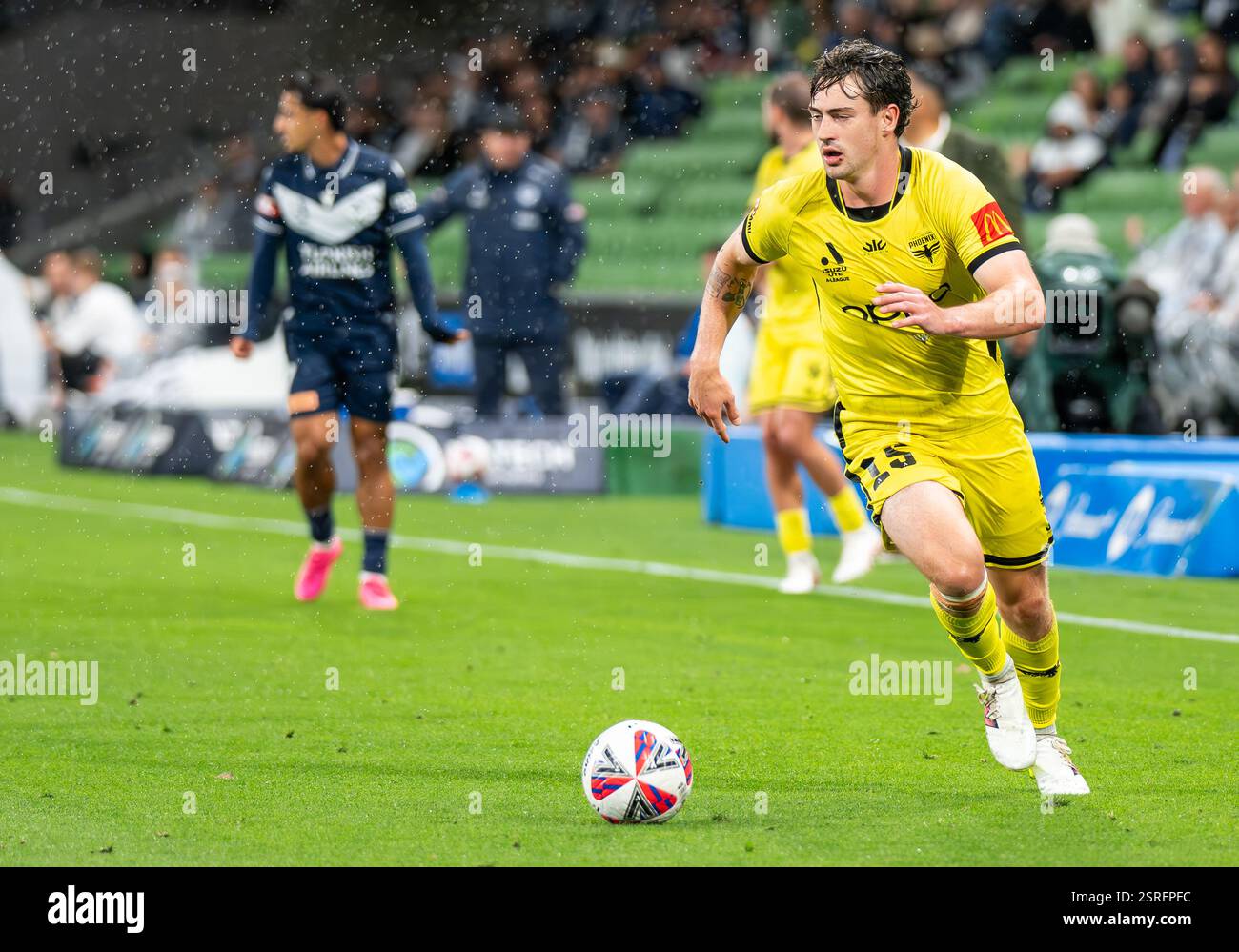 Melbourne, Australia. 14th Feb, 2025. Wellington Phoenix's Isaac Hughes seen in action during ...
