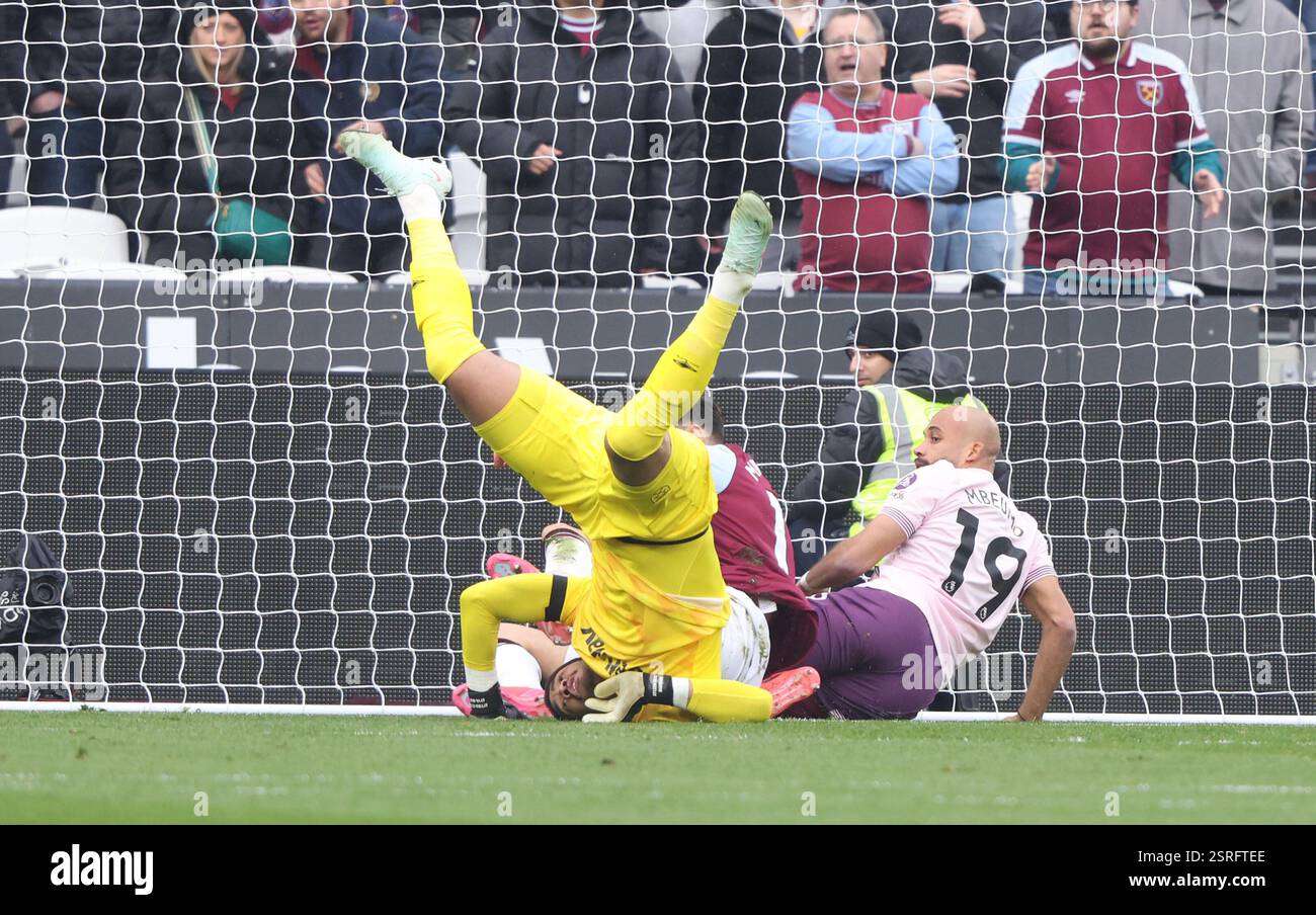 London, UK. 15th Feb, 2025. Alphonse Areola (WHU) is upside down after ...