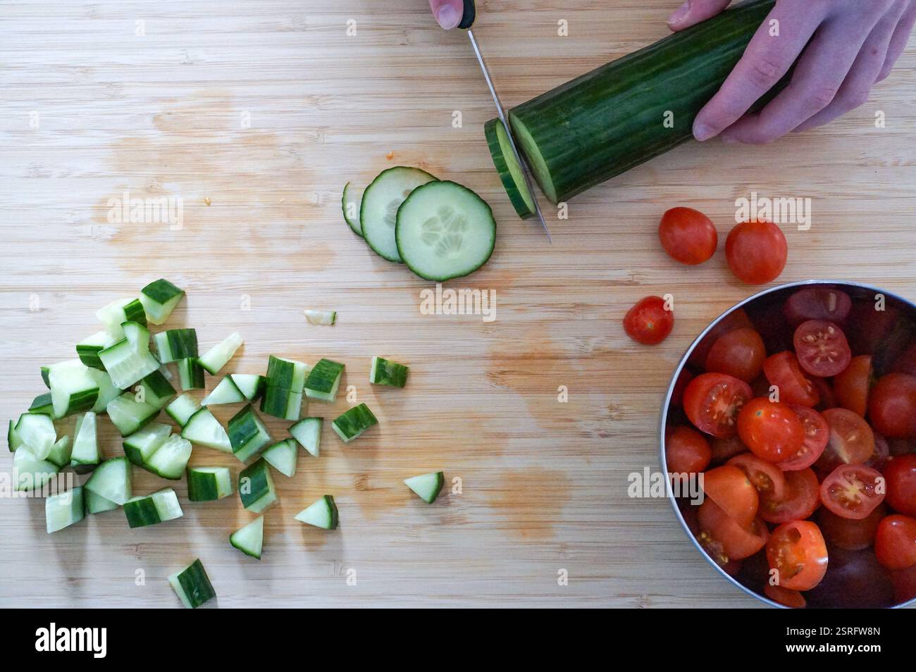 Person cutting up vegetables hi-res stock photography and images - Alamy