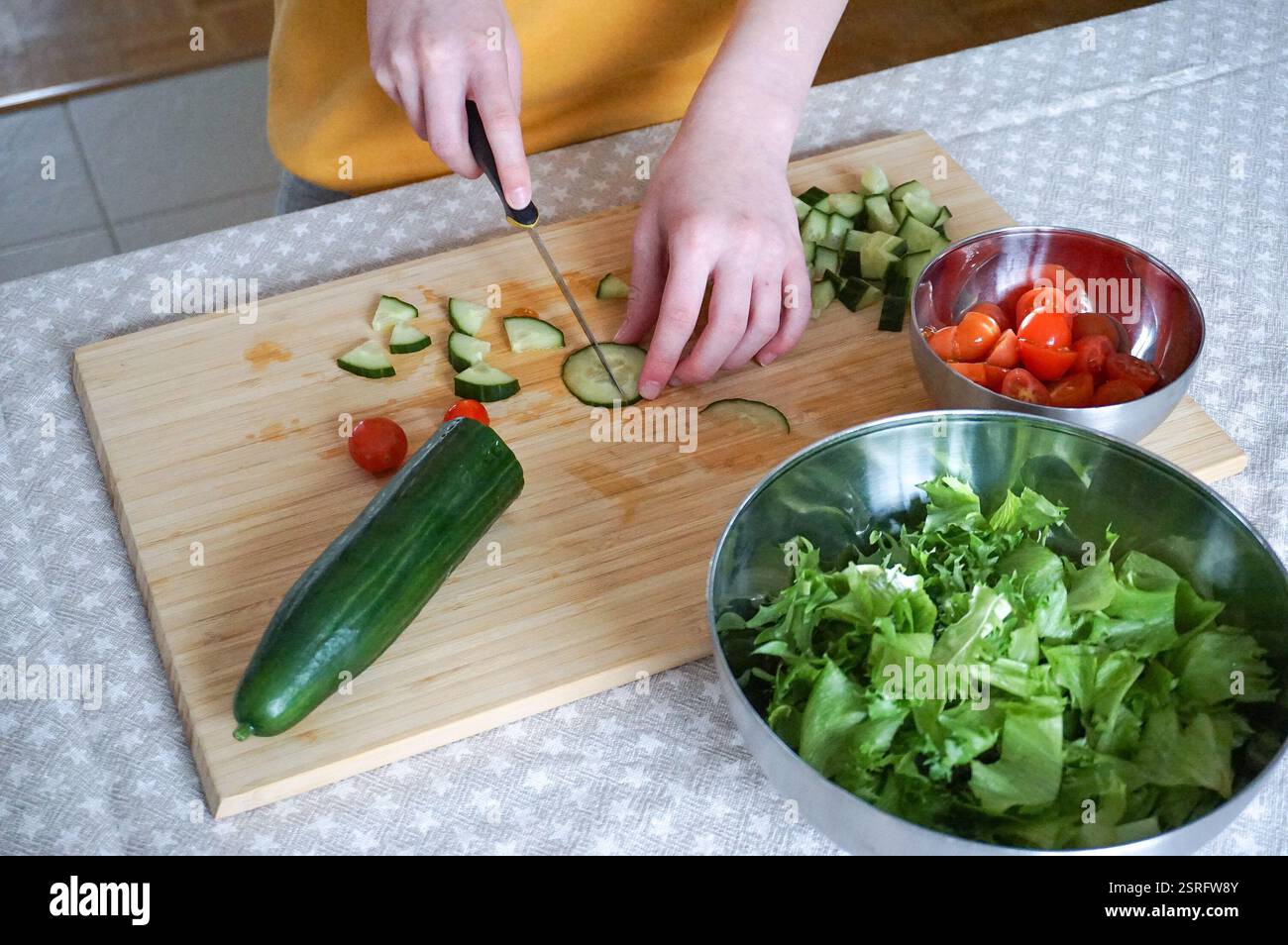 Person chopping vegetables close up Stock Photo - Alamy