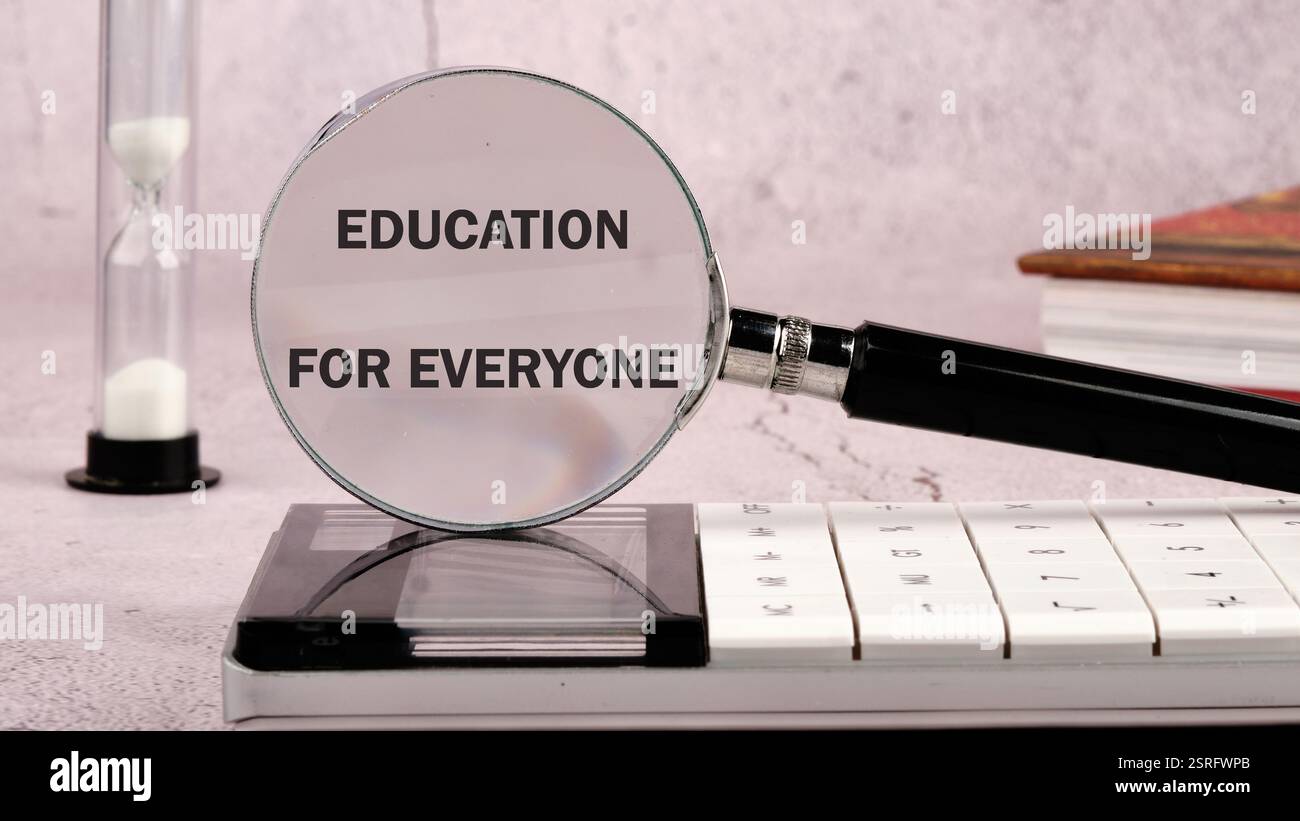 A magnifying glass highlights the text 'education for everyone' on a ...