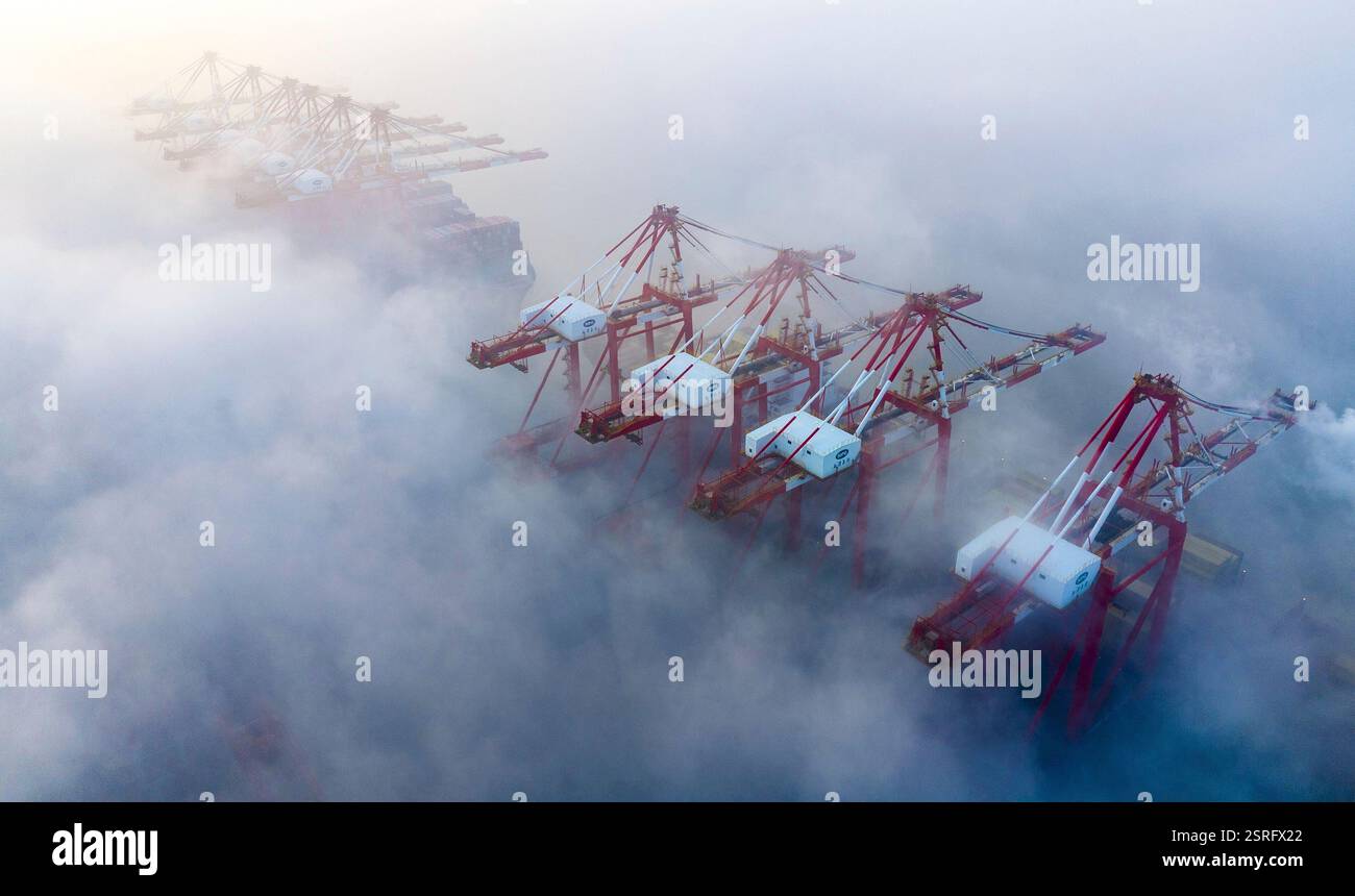 Heavy fog shrouds Yangshan Container Terminal in Shanghai, China Sunday ...