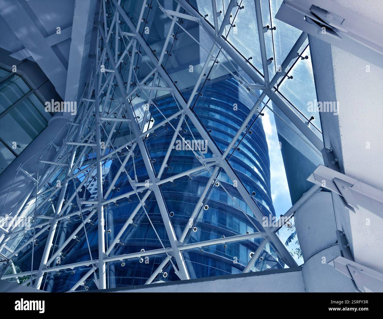 A modern tall building that features a significant amount of glass ...